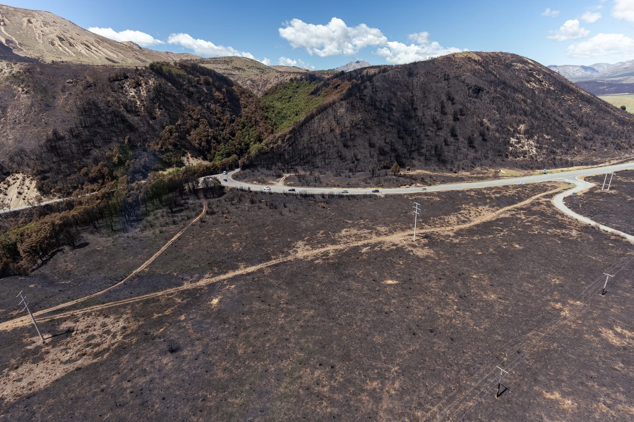 High winds fail to cause major breakouts at Bridge Hill fire - Chris ...